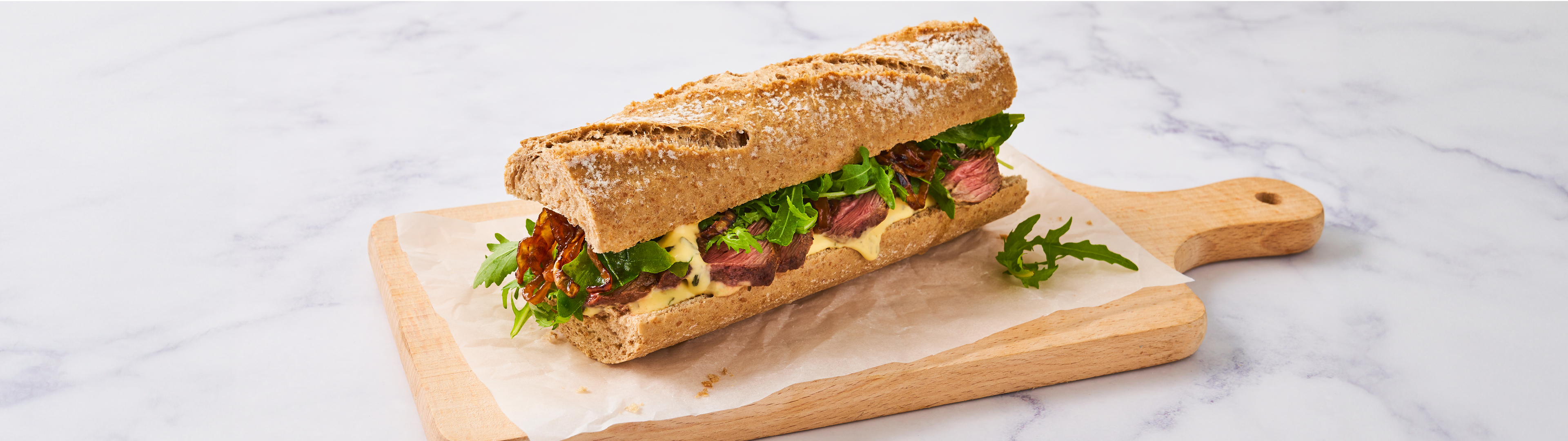 Steak sandwich with bearnaise, rocket and onion| LLBG Bakery Solutions ...